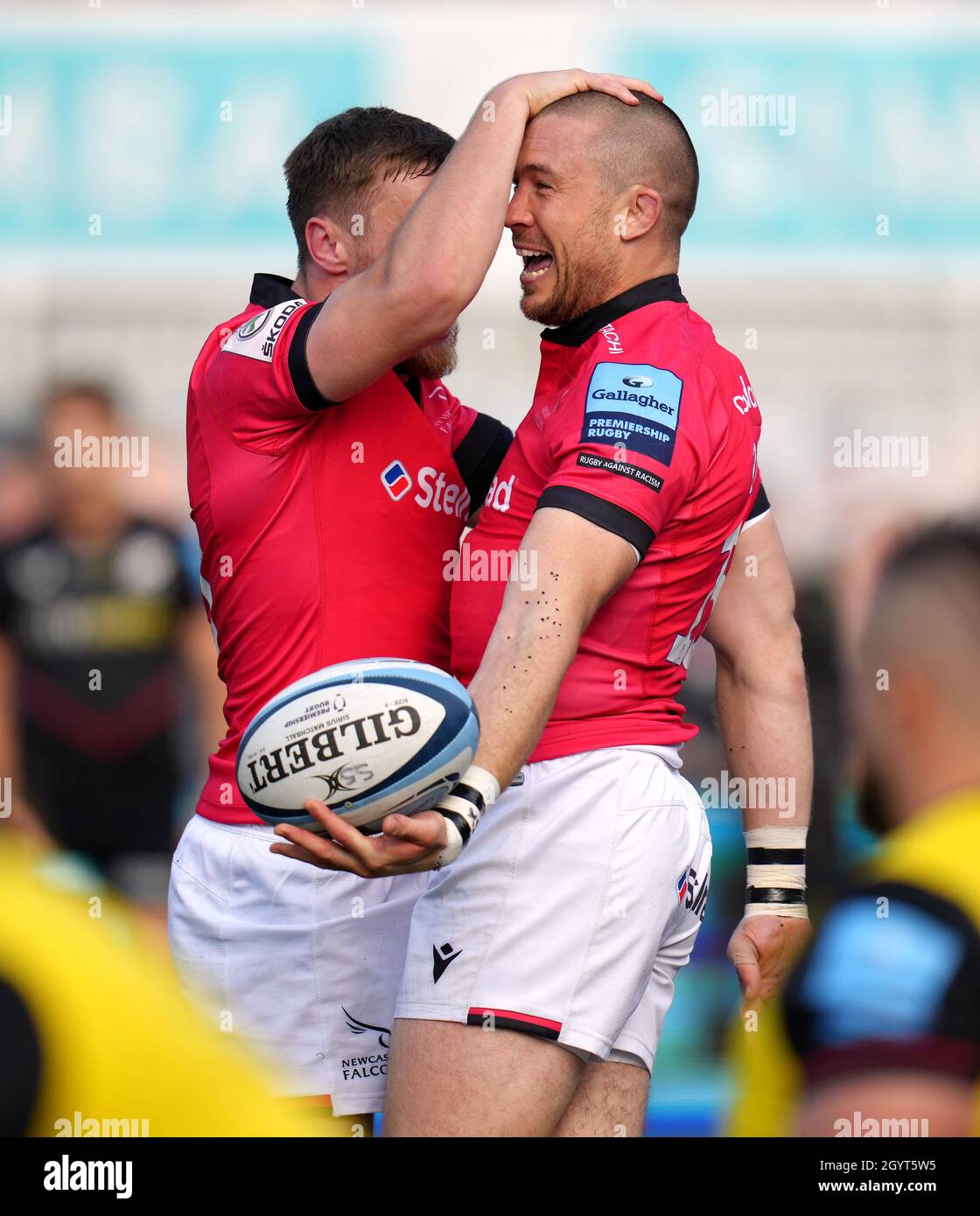 Newcastle Falcons Mike Brown (right) celebrates scoring his side’s ...