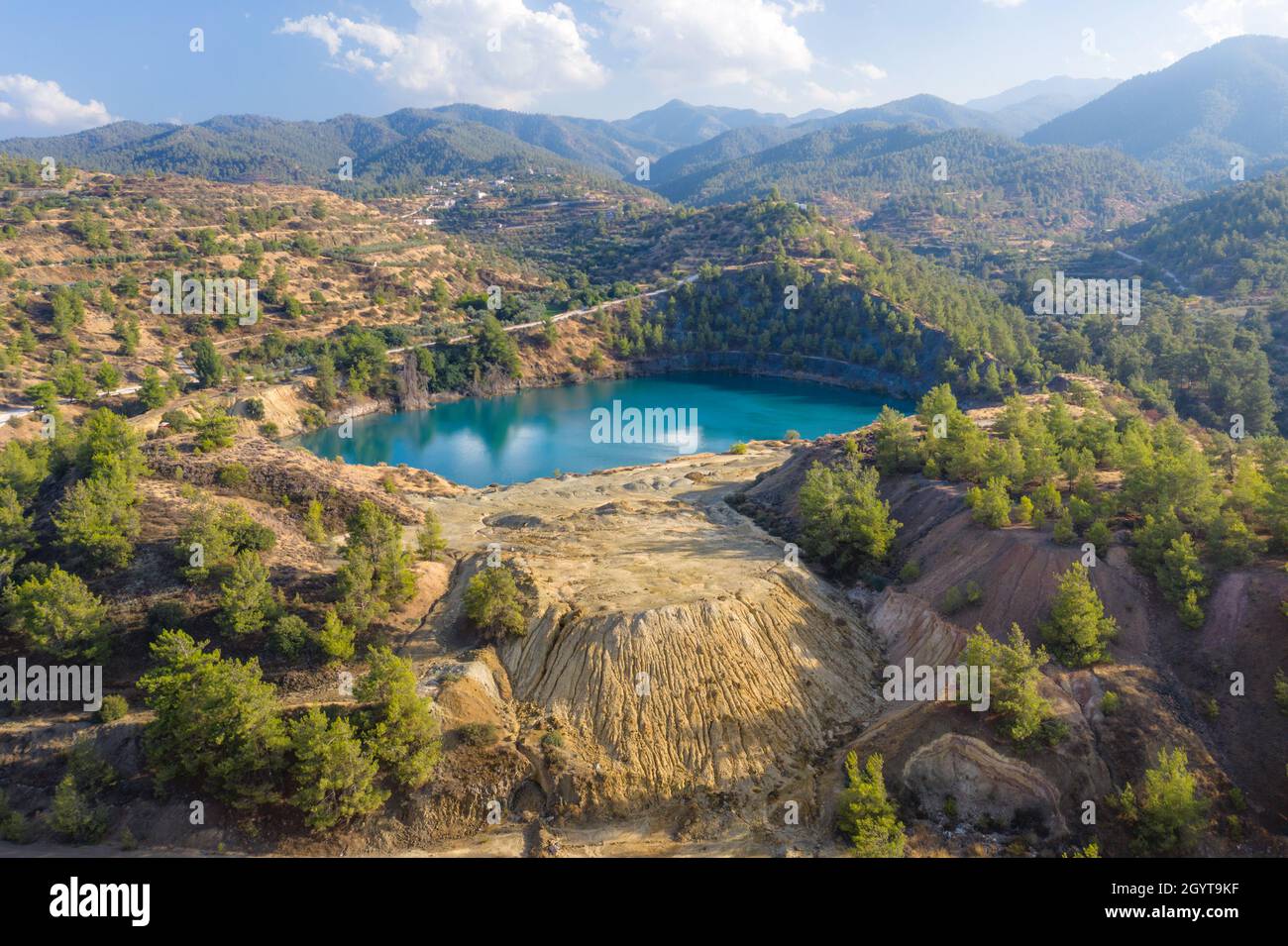 Abandoned pyrite mine in Xyliatos, Cyprus. Lake in open mine pit and ...