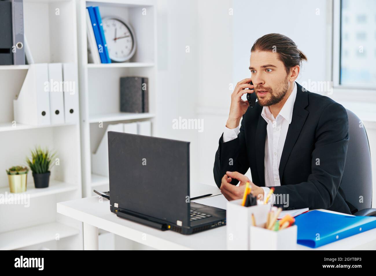 businessmen at the desk documents communication by phone boss Stock ...