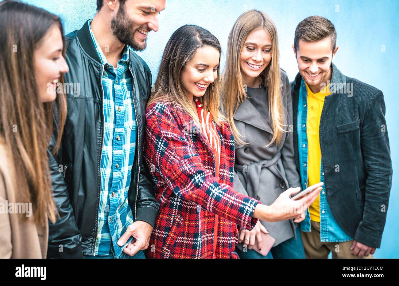 Millenial friends on addicted moment using mobile smart phones - Young ...