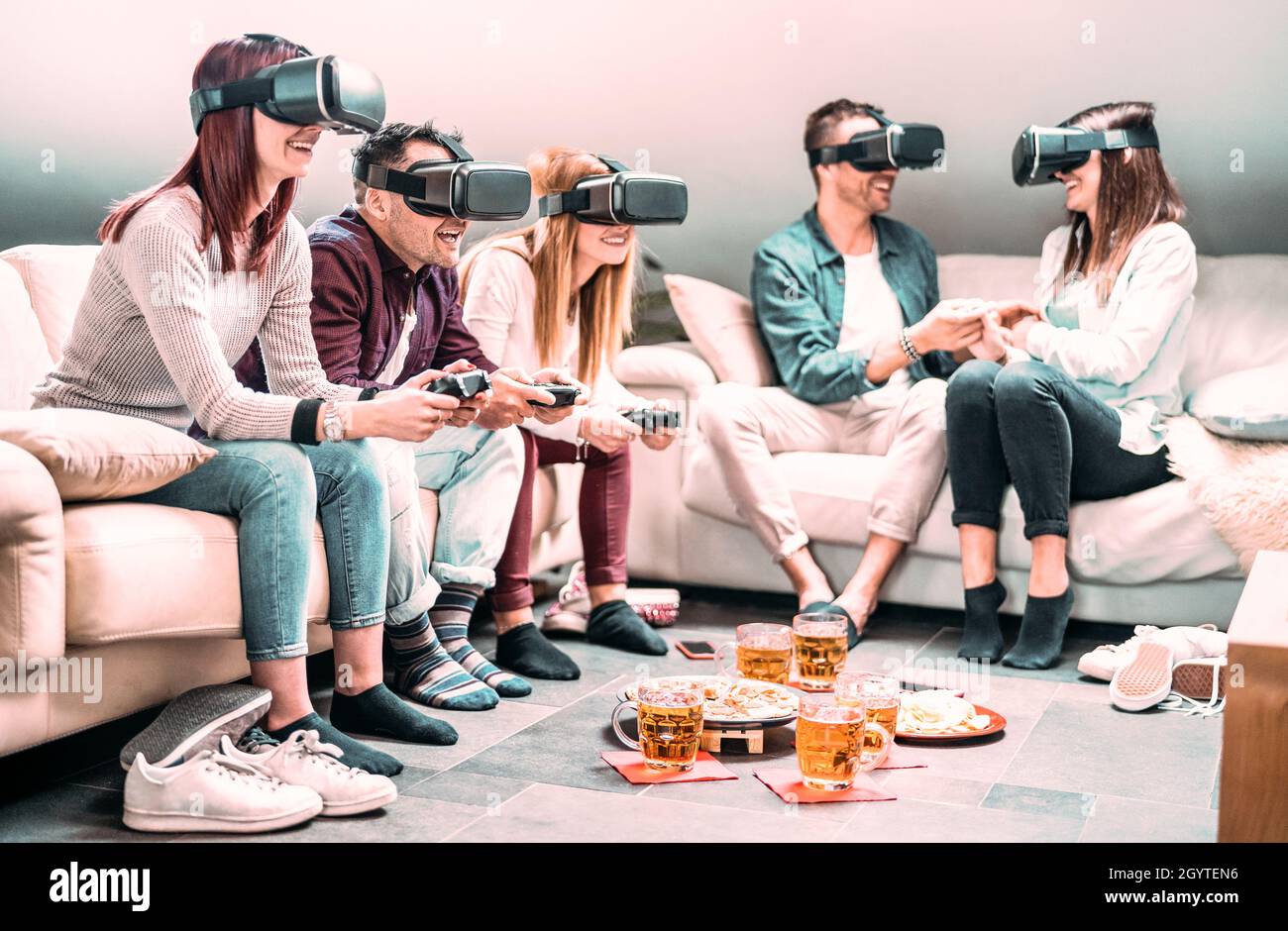 Friends playing with vr headset at home - Virtual reality and wearable ...
