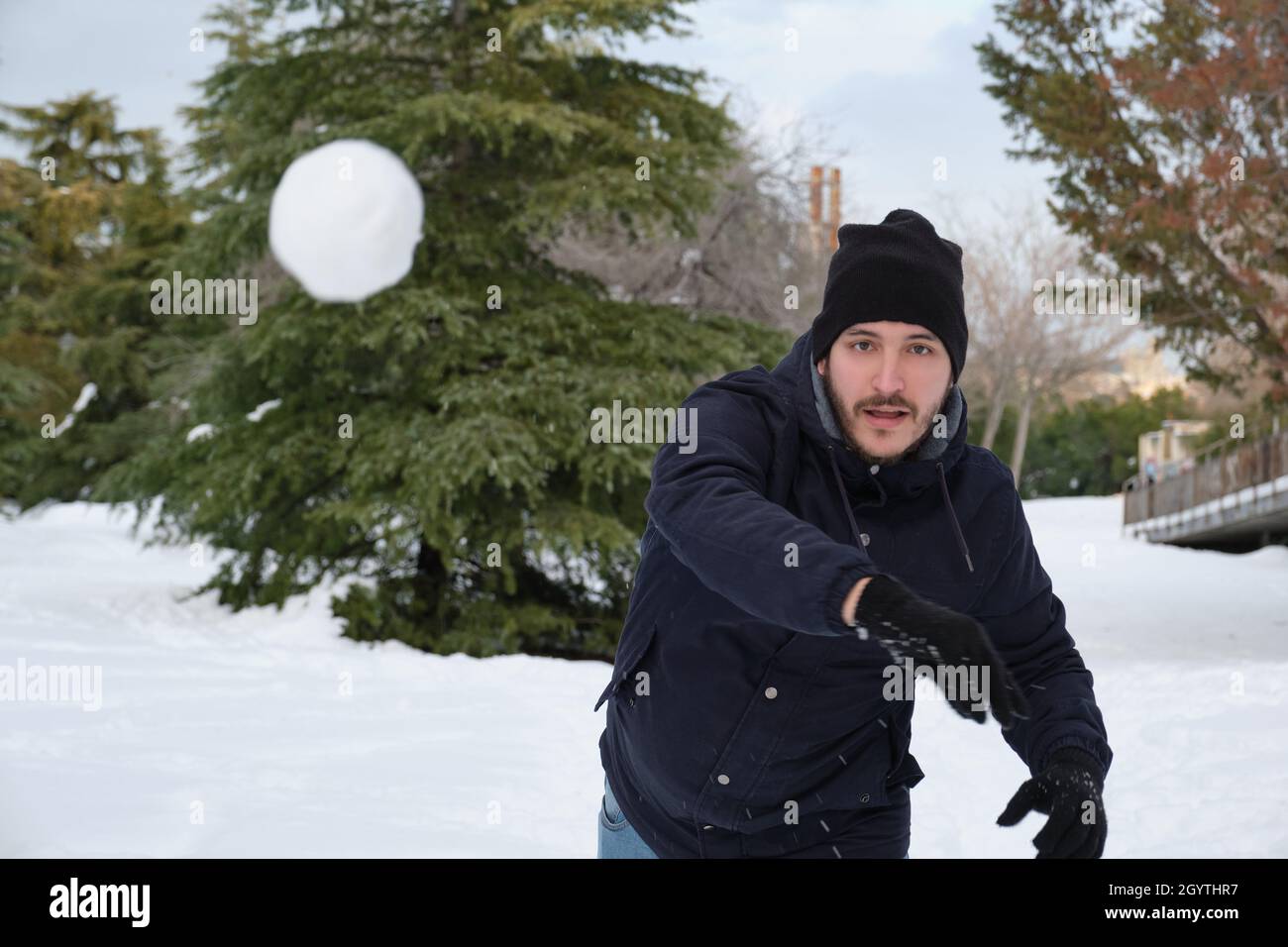 Man throwing a snowball hi-res stock photography and images - Alamy