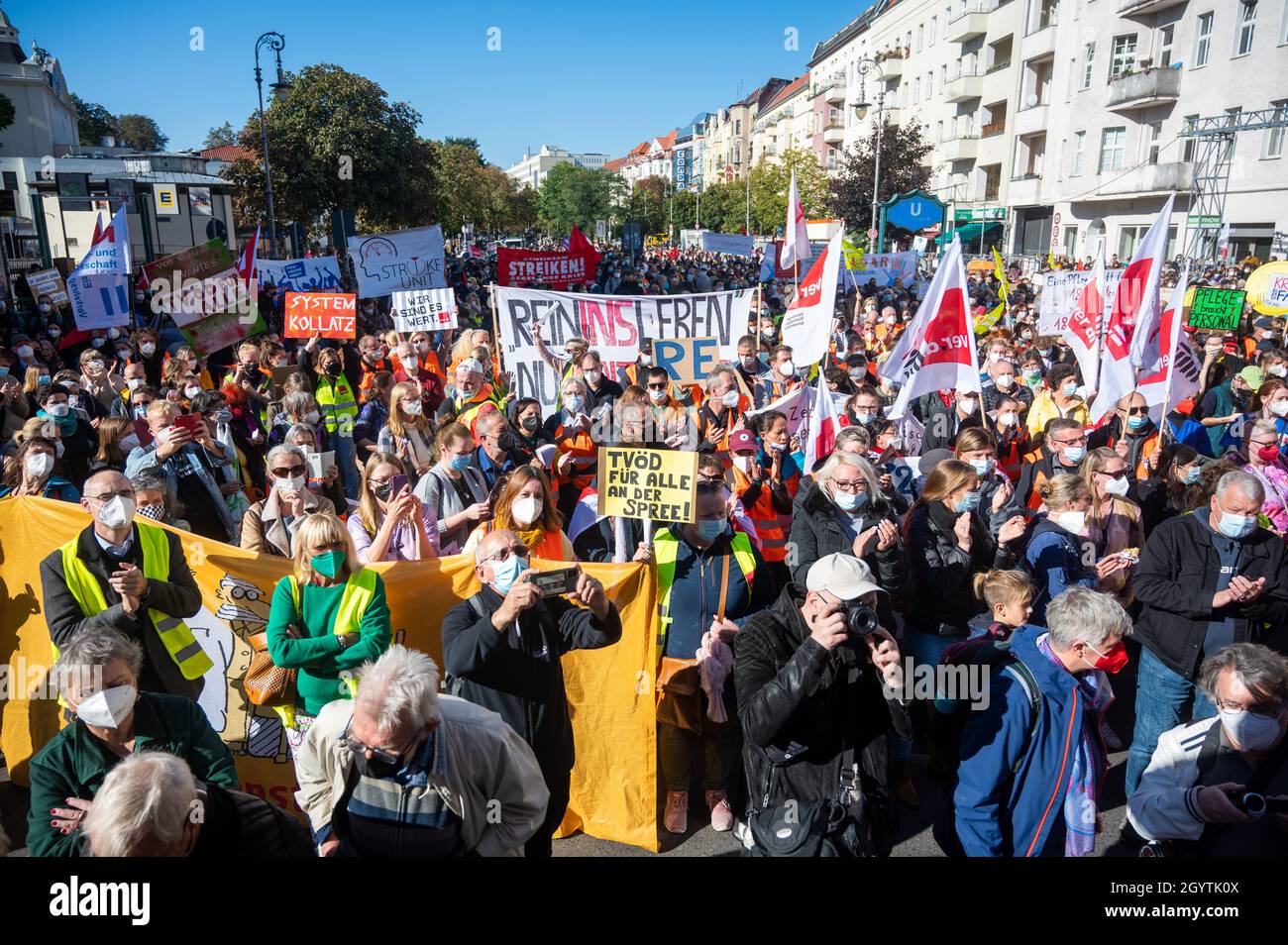 Berlin, Germany. 09th Oct, 2021. Participants carry banners and ...