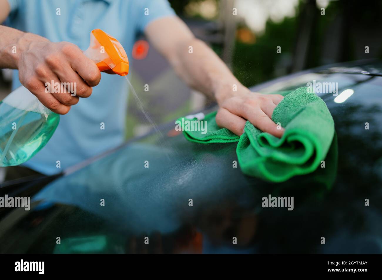 Man using water hose wash hi-res stock photography and images - Alamy