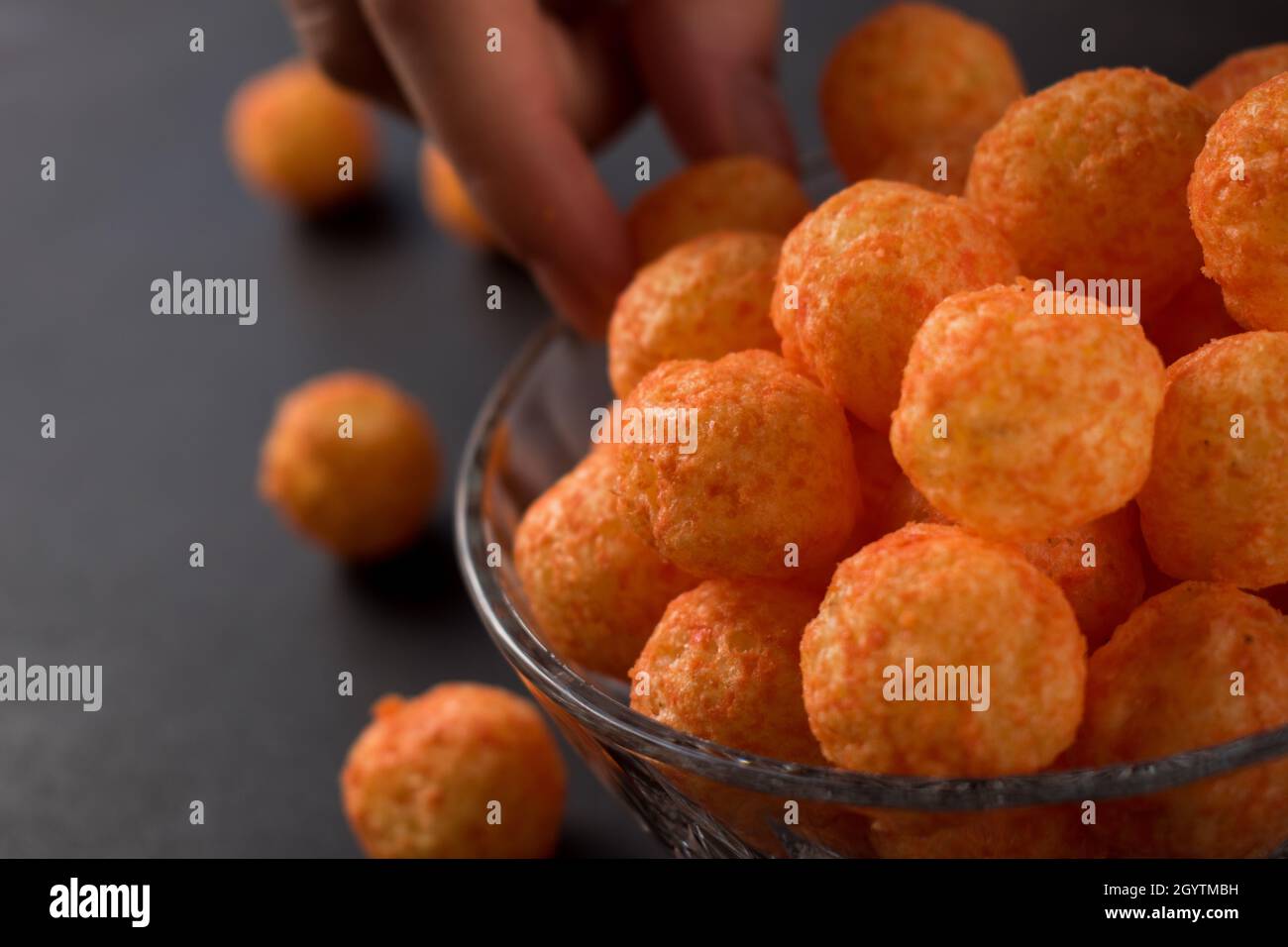 Full bowl of crispy and crunchy snacks Stock Photo - Alamy