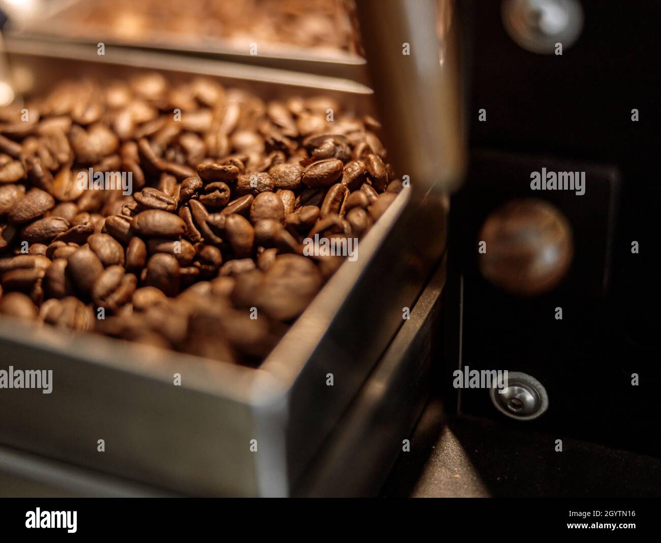 Industrial coffee roasting machine with roasted coffee beans Stock ...