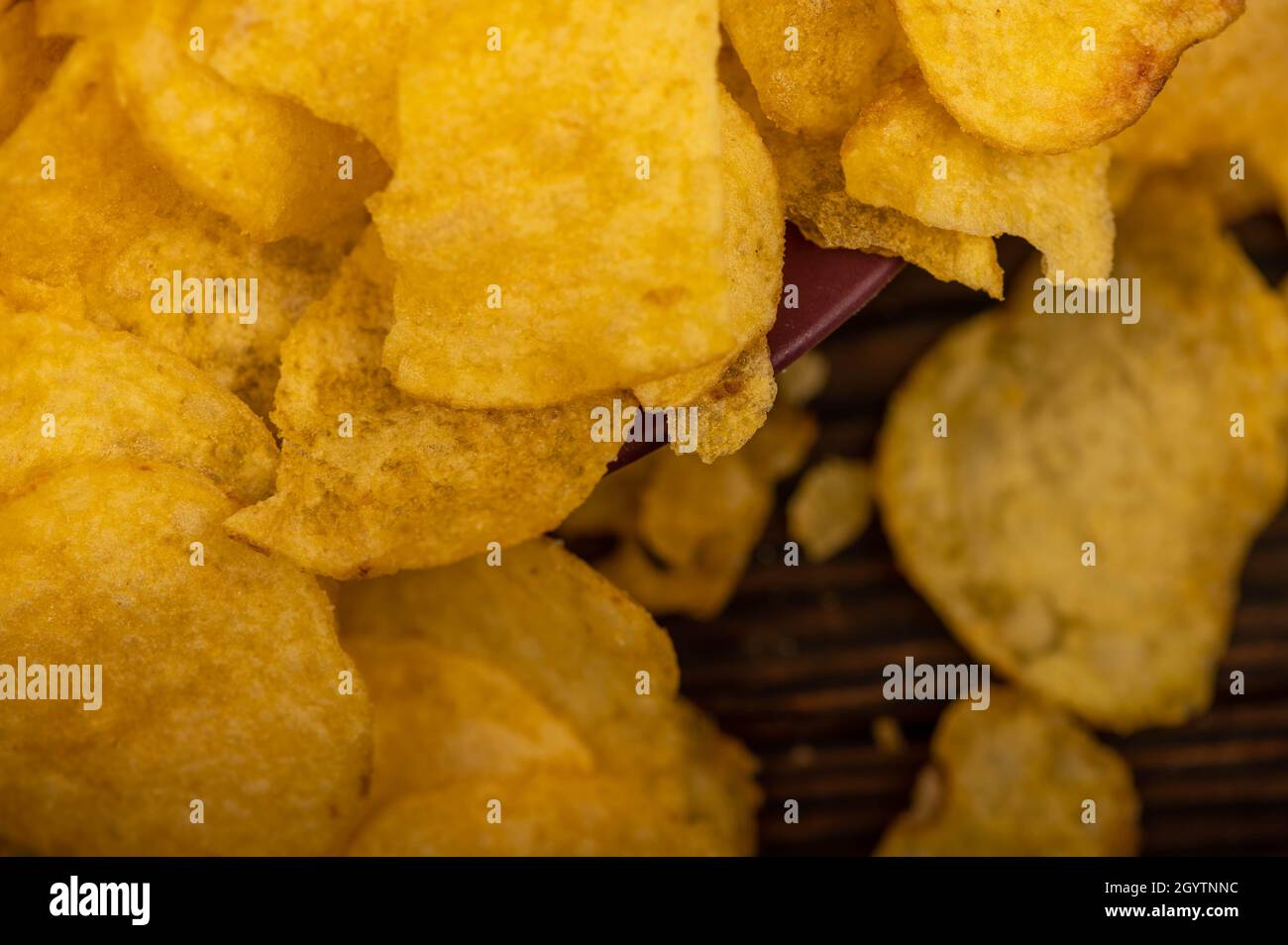Potato chips scattered on the table, close-up, selective focus Stock ...