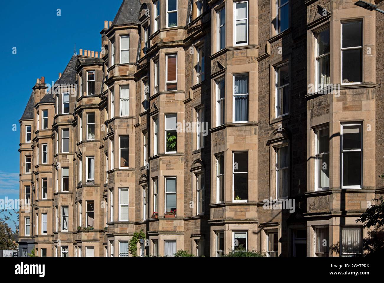 Sunshine striking Victorian tenement buildings in Viewforth, Edinburgh ...
