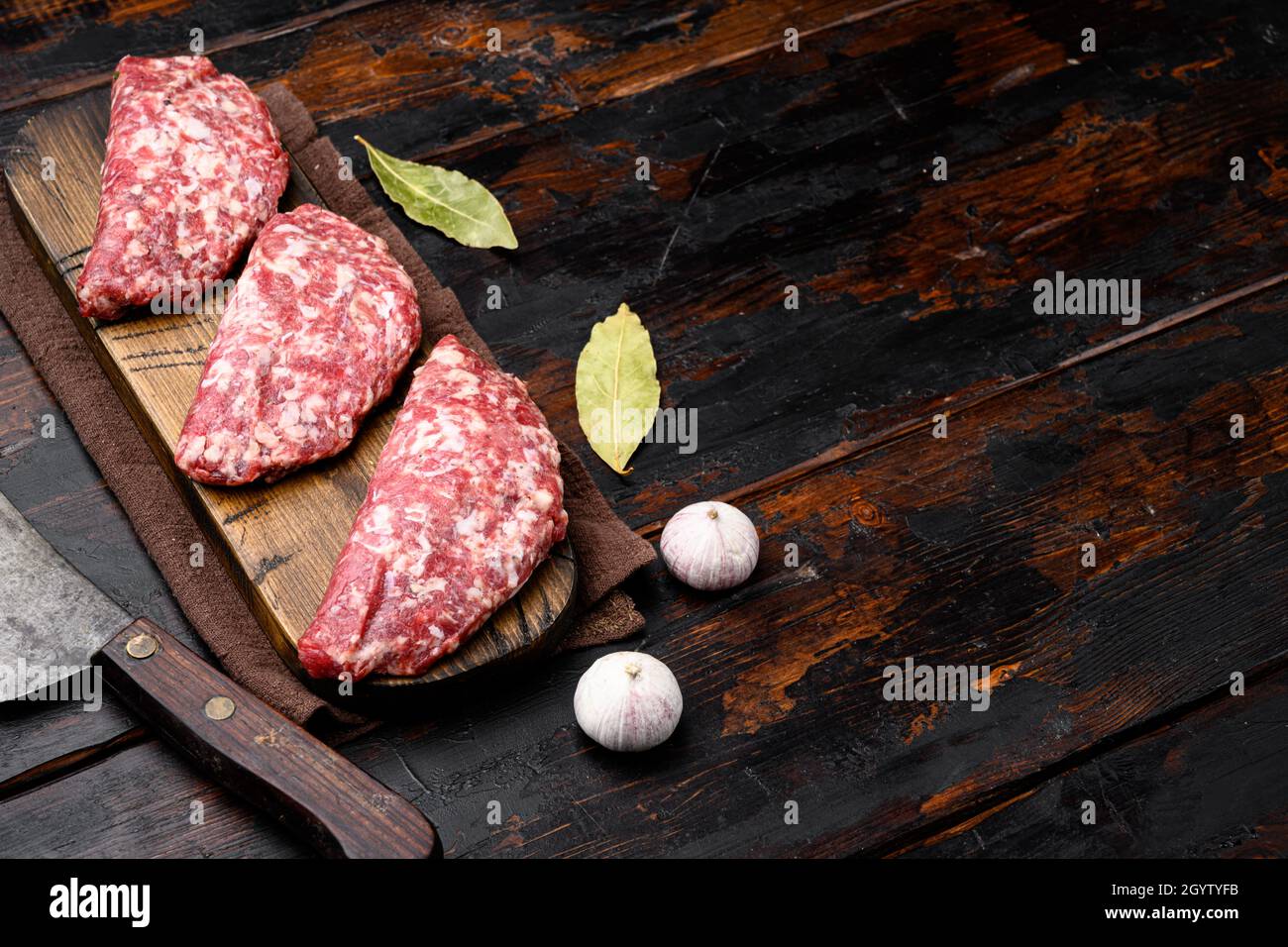 Ground raw meat patties. Meat cutlet ready to cook. Farm organic meat ...