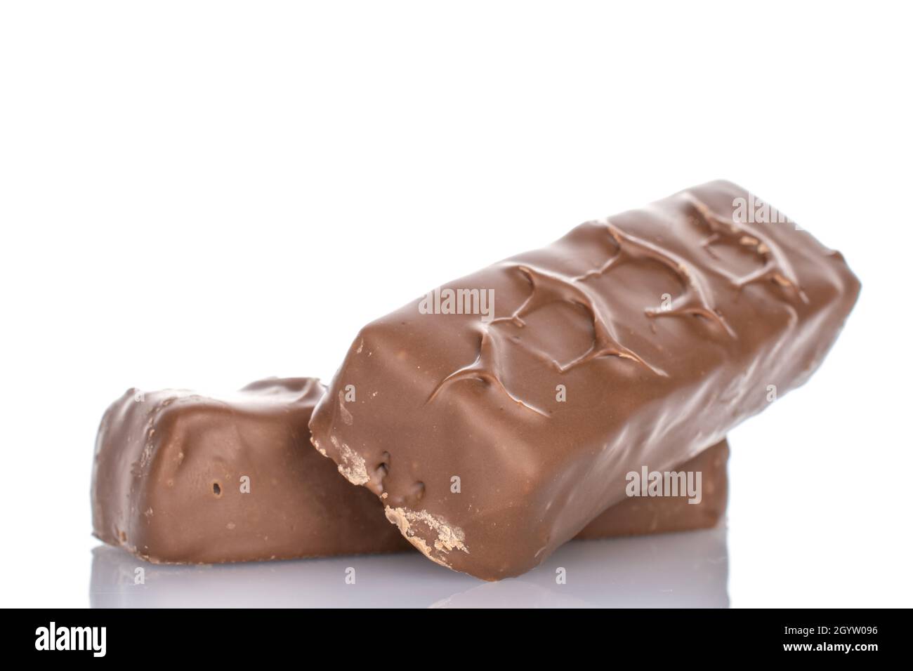 Two sweet chocolate bars, close-up, isolated on white Stock Photo - Alamy