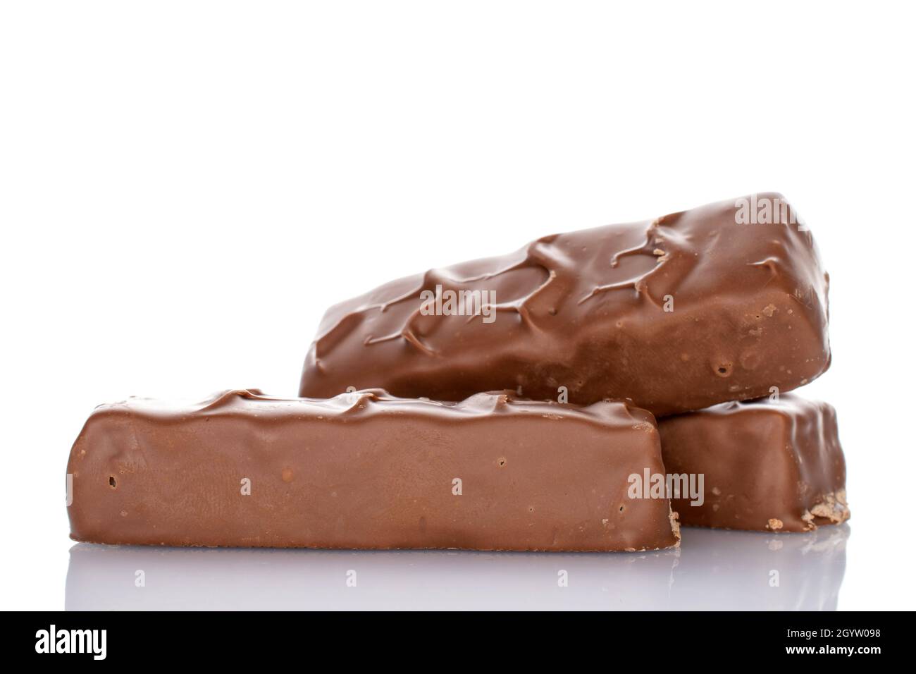 Three sweet chocolate bars, close-up, isolated on white Stock Photo - Alamy