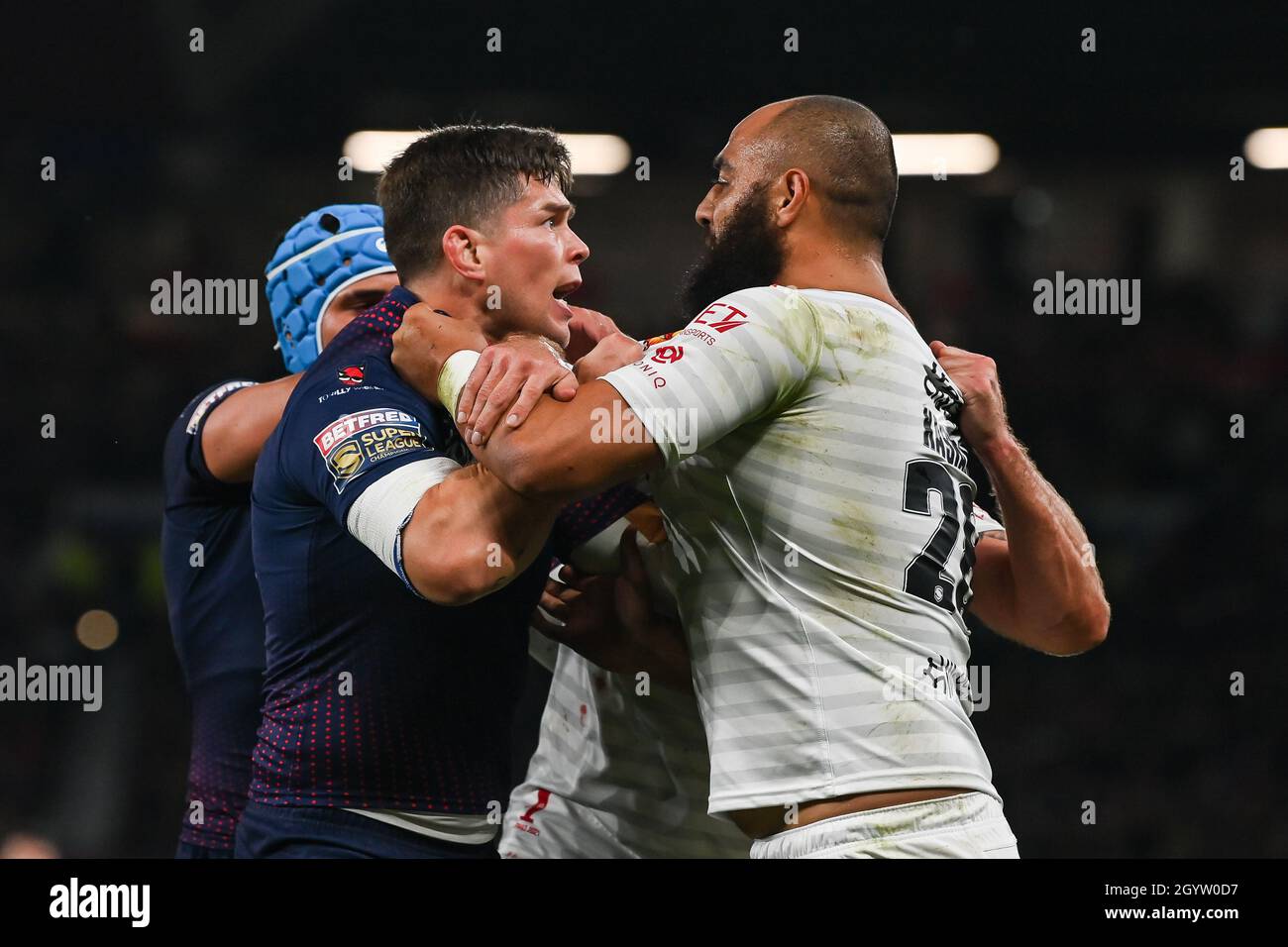 Louie McCarthy-Scarsbrook (15) of St Helens and Sam Kasiano (28) of ...
