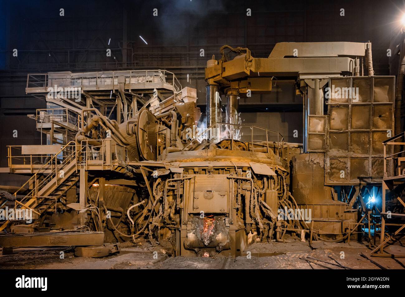 Electric steel furnace, glowing graphite electrodes Stock Photo - Alamy