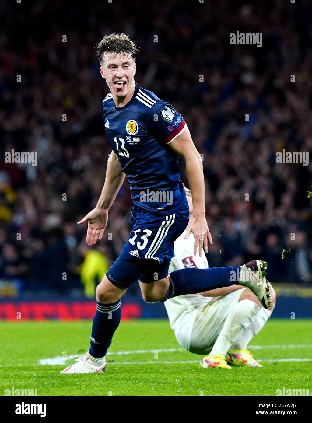 Scotland's Jack Hendry celebrates after assisting team-mate Scott ...