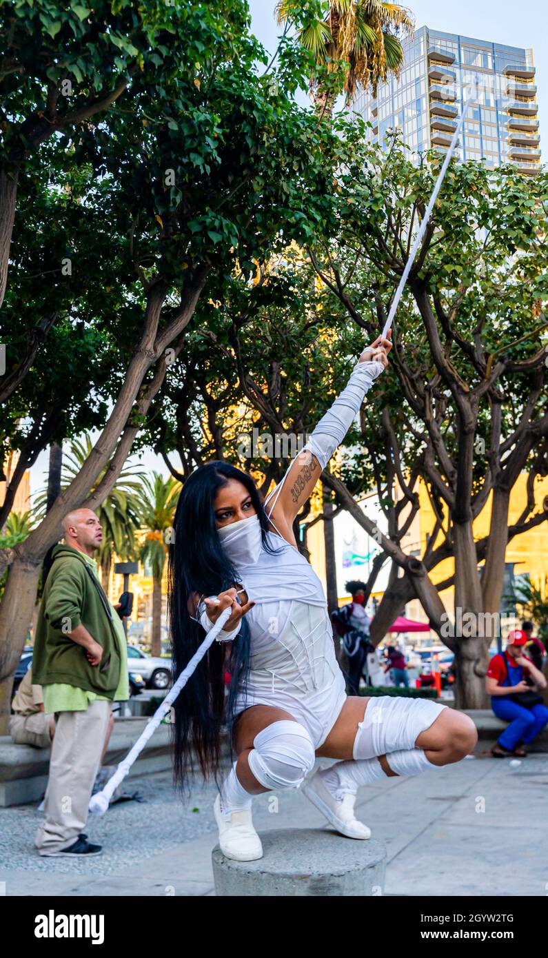 Female attendee cosplayer portraying spider-girl spider-woman at Comic ...
