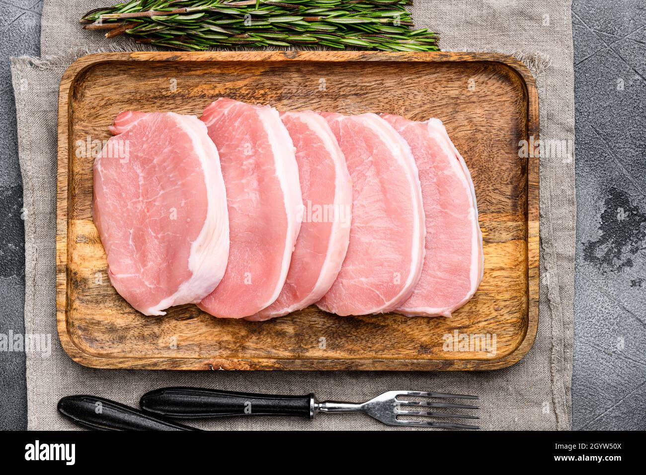 Pork chop sliced fresh meat set, on gray stone table background, top ...