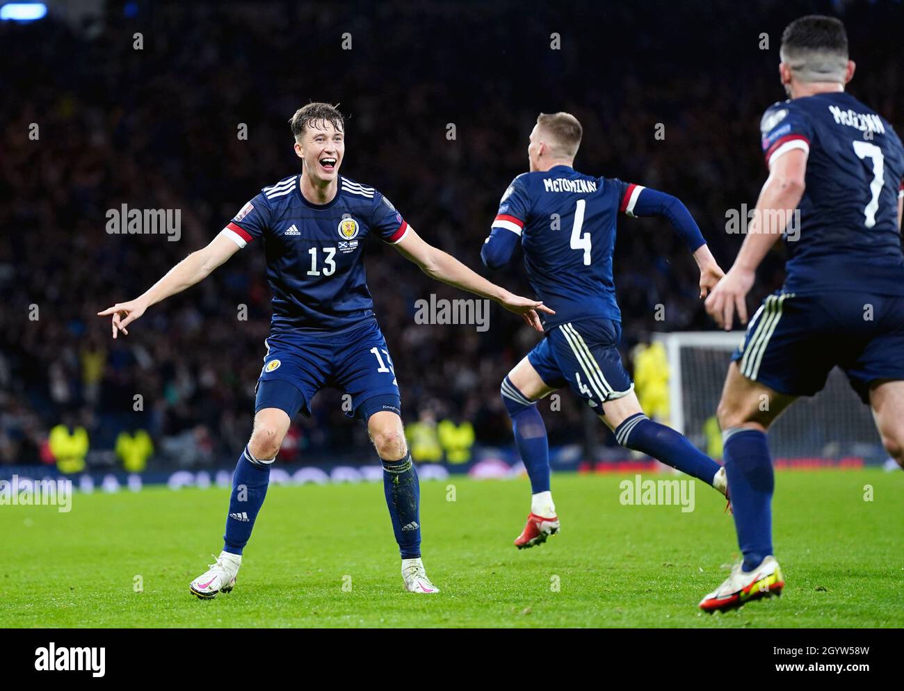 Scotland's Jack Hendry (left) celebrates after assisting team-mate ...