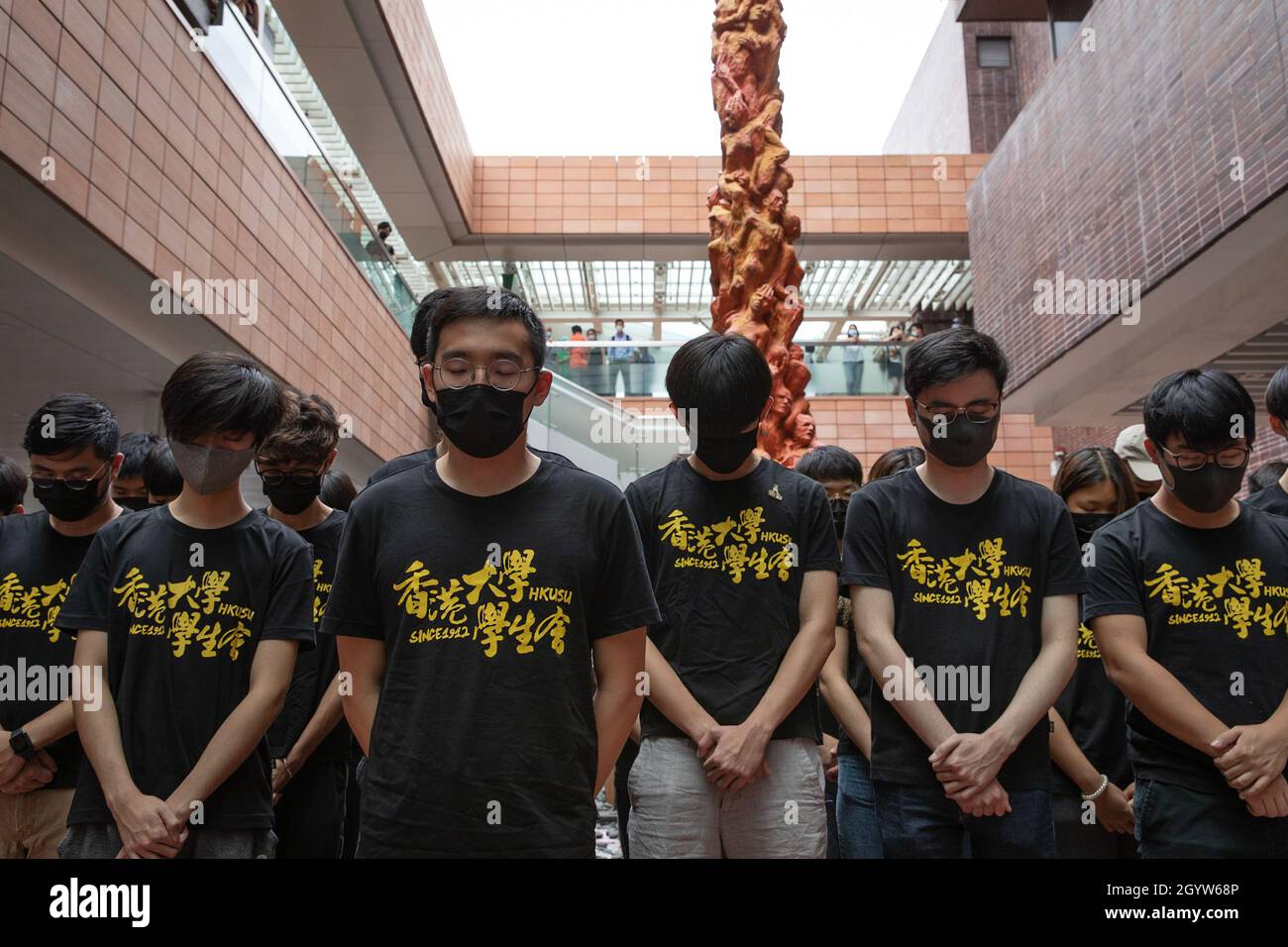 Members of the Hong Kong University Student Union pay tribute to the victims of the Tiananmen ...