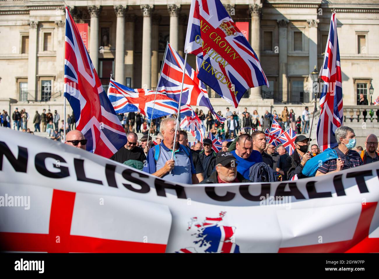 London, UK. 09th Oct, 2021. Protesters hold Union Jack Flags during the ...