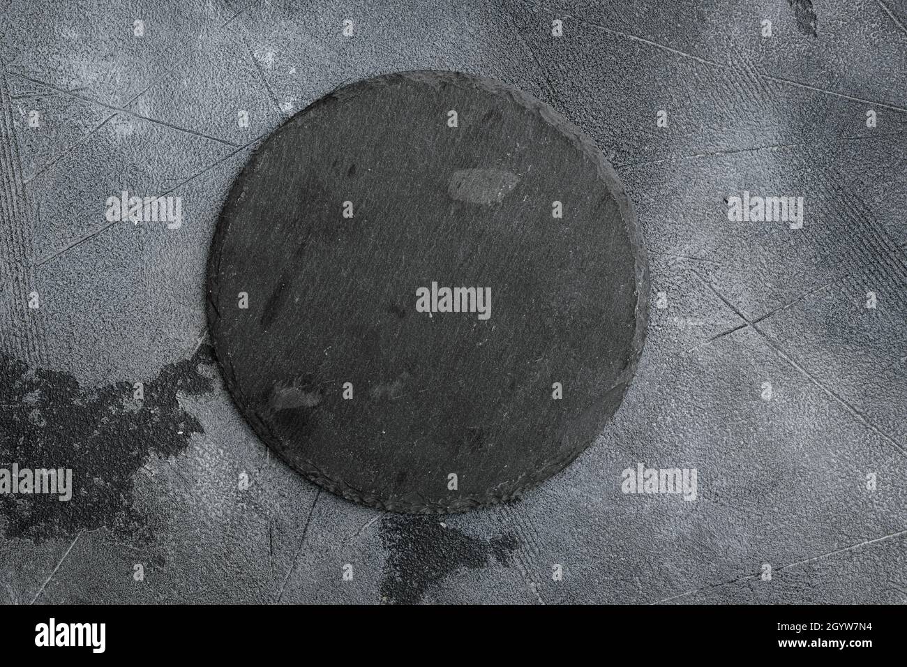 Cooking utensils empty stone cutting board with copy space for text or ...