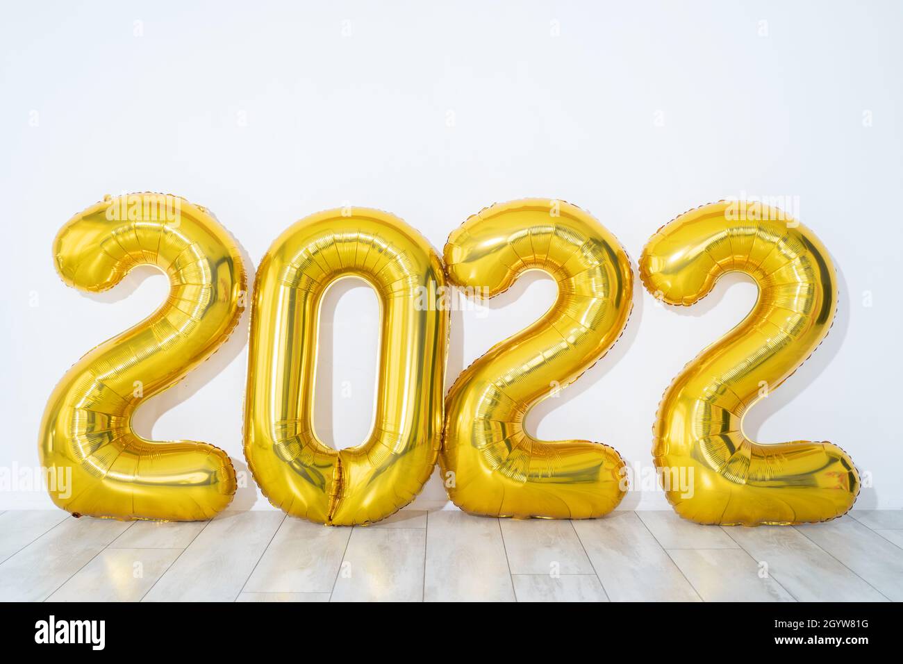 New year concept. Gold Party balloons 2022 numbers shape on white ...