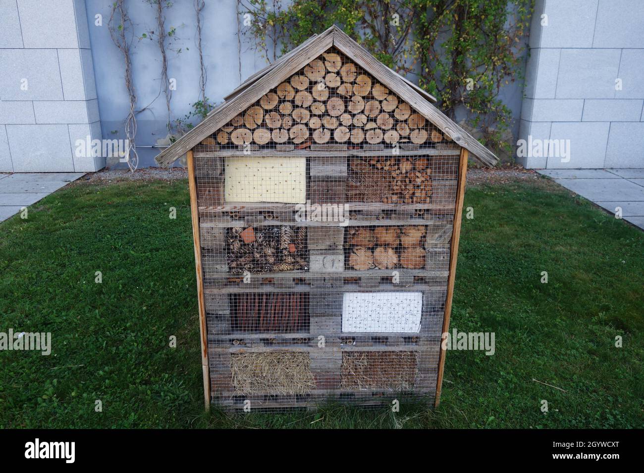 An insect hotel, also known as a bug hotel or insect house, is a ...