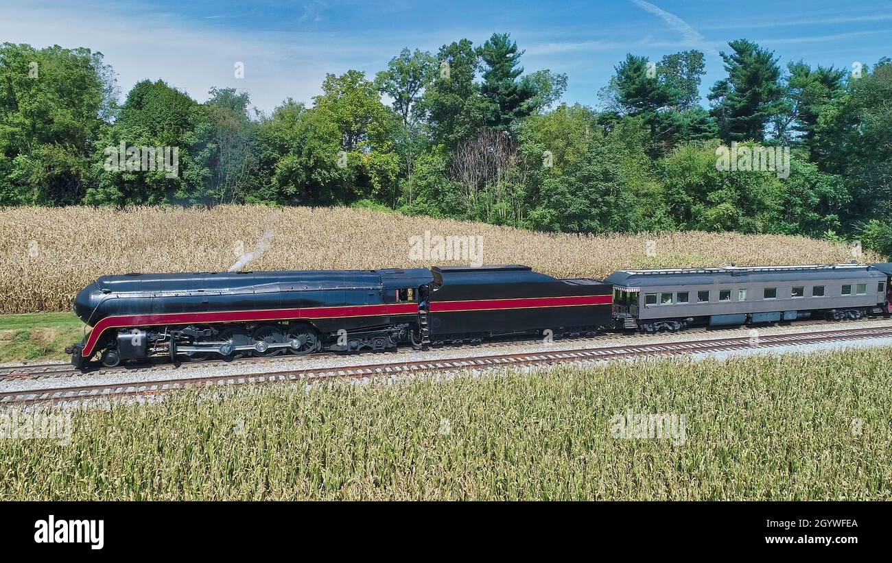 An Aerial View of an Antique Restored Steam Engine Blowing Smoke and ...