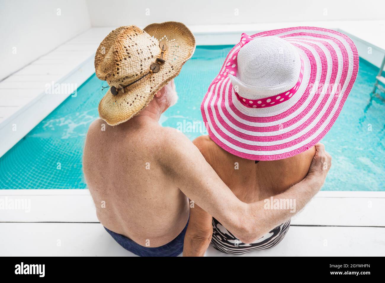 Happy Senior Couple Having Party In The Swimming Pool Elderly Friends