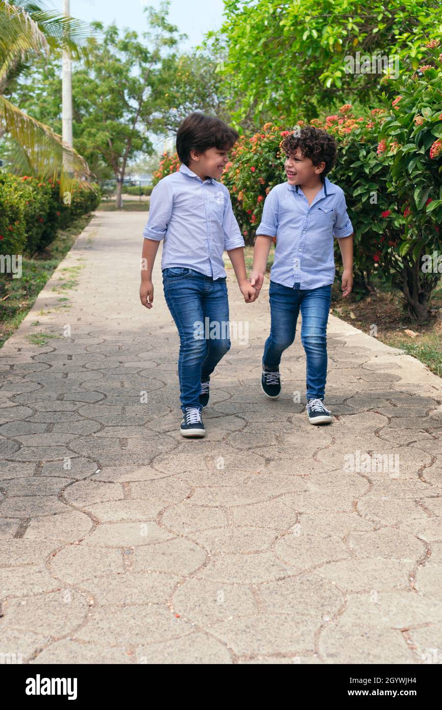 Two People Walking Hand In Hand