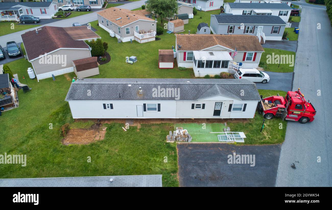 Aerial View of a Manufactured, Mobile, Prefab Home Being Removed from a ...