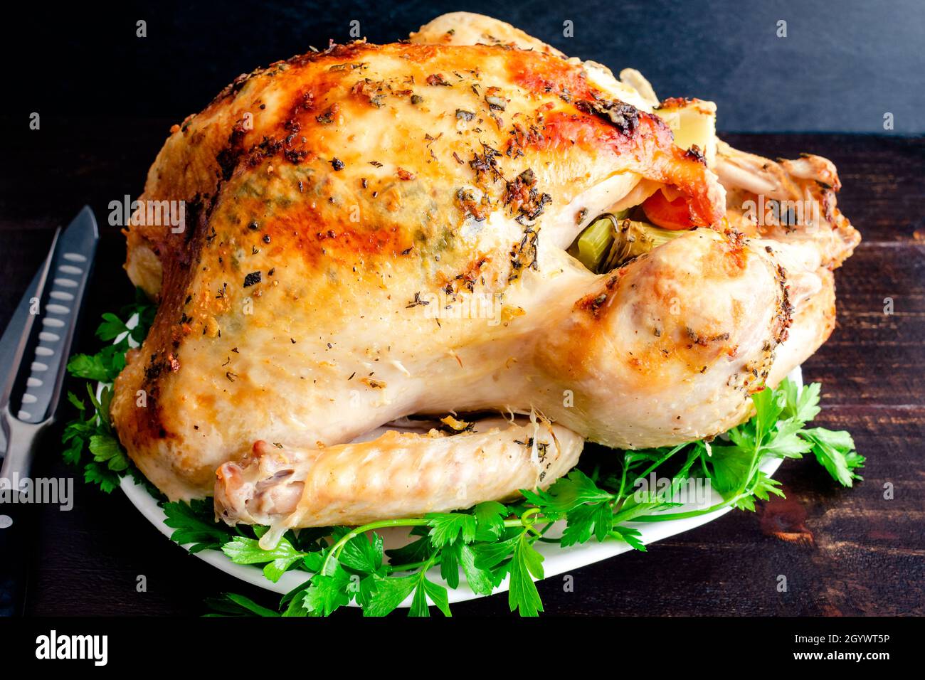 Whole Roasted Turkey on a Platter: Closeup view of a whole turkey on a ...