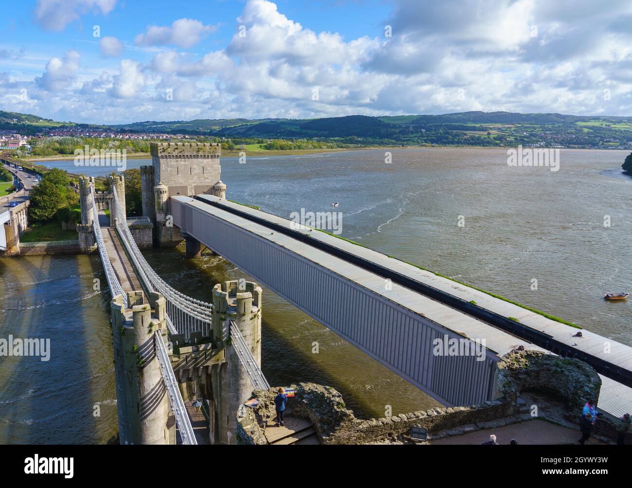 the modern tower and concealed train line at conwy castle next to the ...
