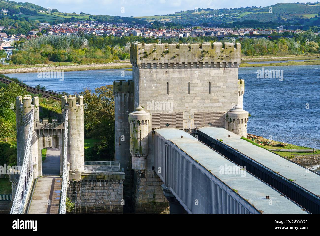 the modern tower and concealed train line at conwy castle next to the ...