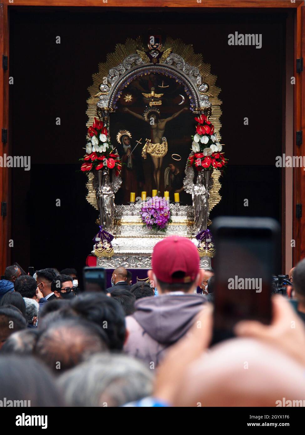The lord of miracles seen from outside the church by the crowd. This ...