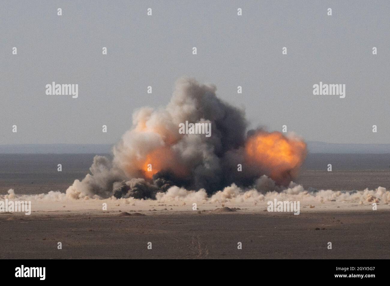 F-15E Strike Eagles offload general purpose bombs for training at a ...