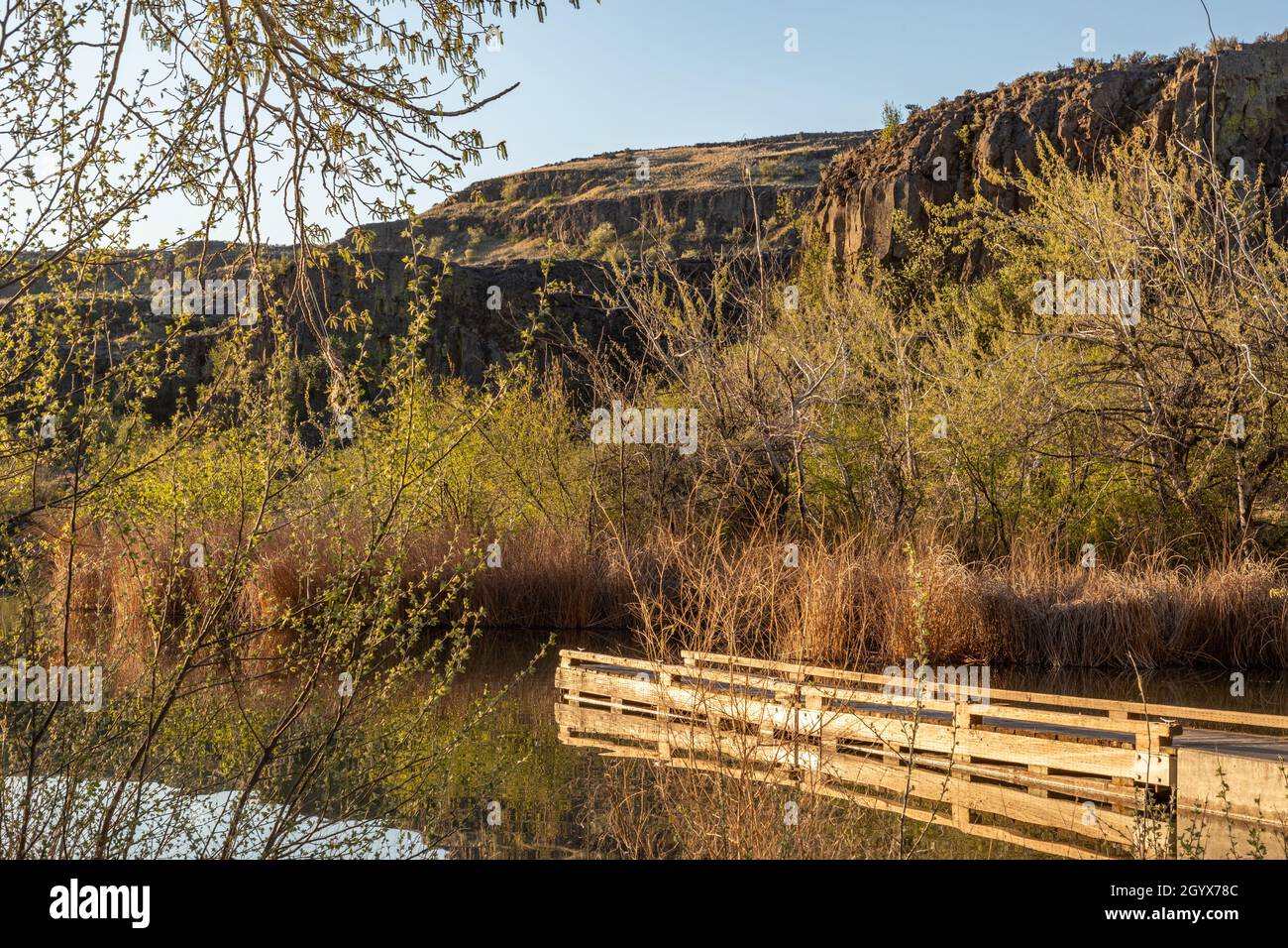 Deep Lake Boat Launch Dock Glows at Sunrise in Sun Lakes State Park ...