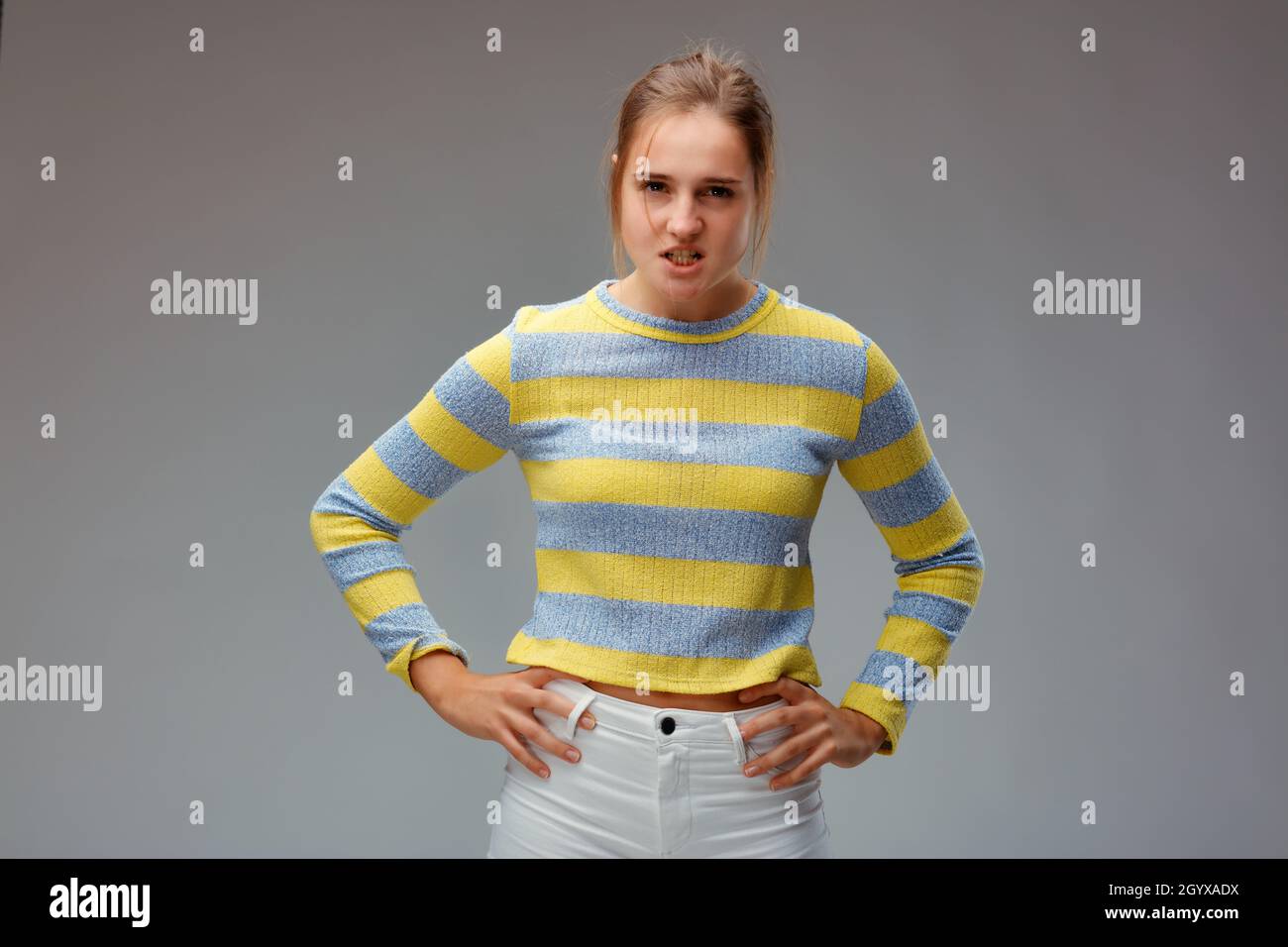 Anger makes you beautiful! Portrait of a young woman so angry she bared ...