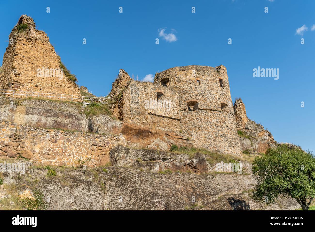 Aerial view of partially restored medieval Filakovo Fulek castle in ...