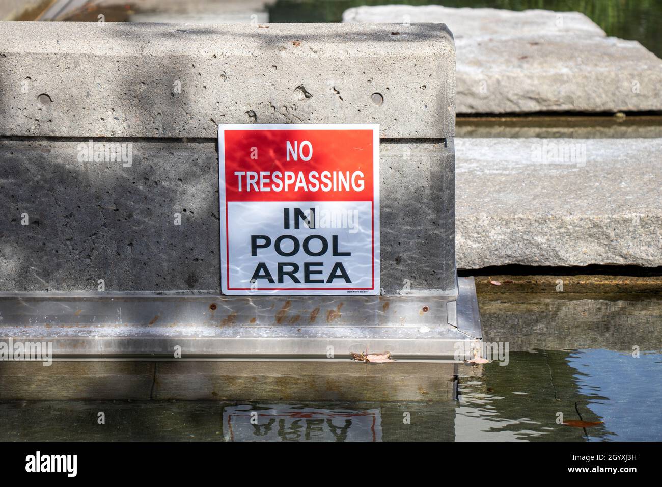 View of warning sign No trespassing in pool area in Vancouver Stock ...