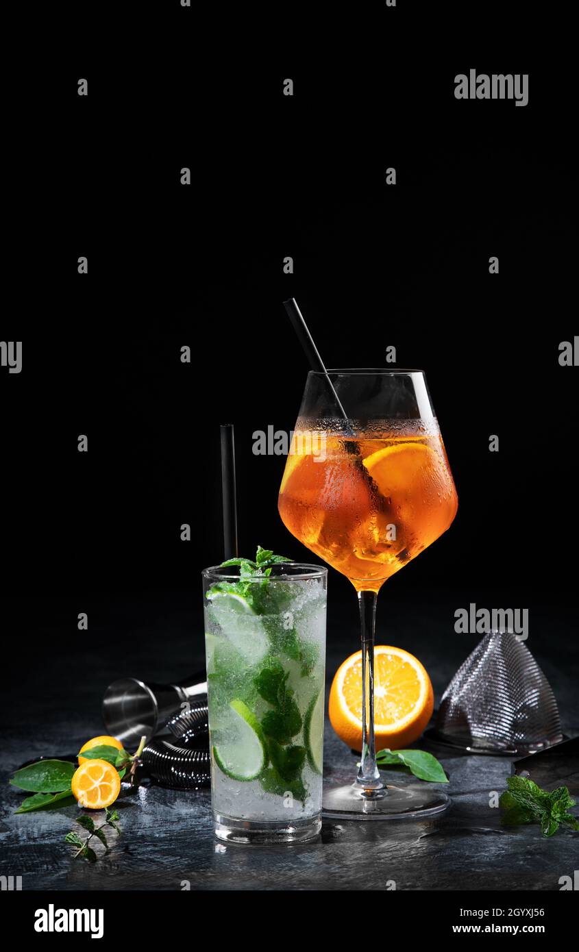 Cocktails assortment served on dark background. Classic drink menu ...