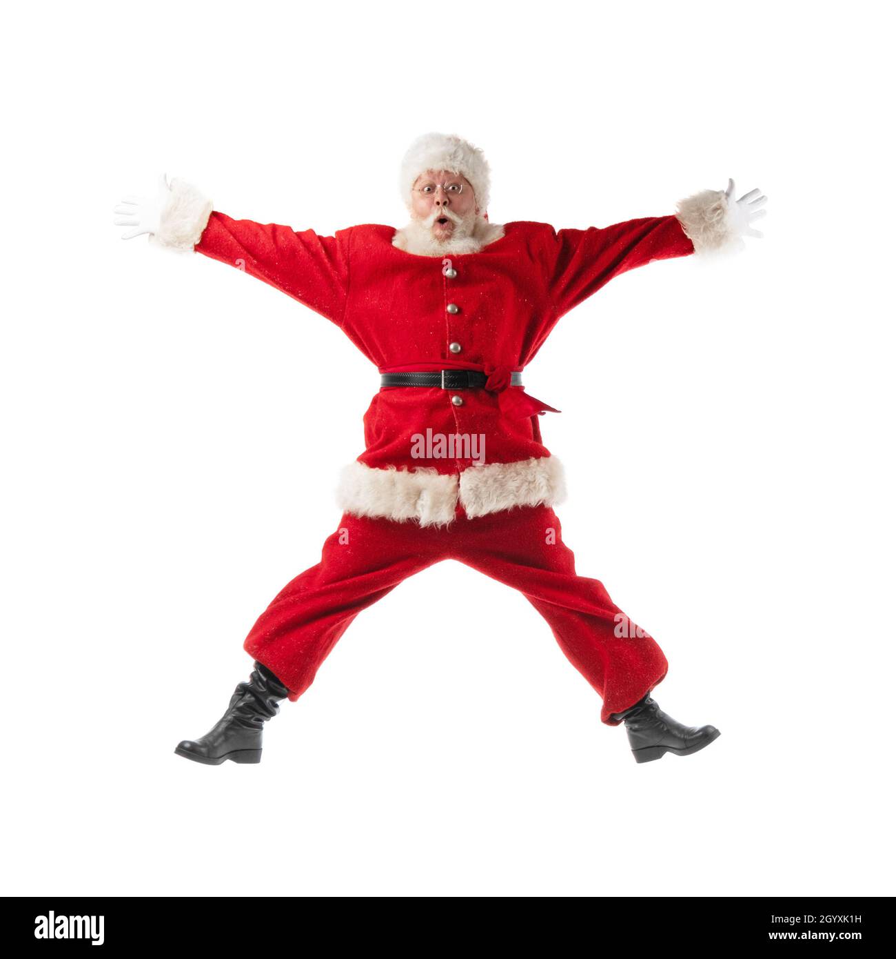 Santa Claus jumping with hands lifted upwards isolated on white ...