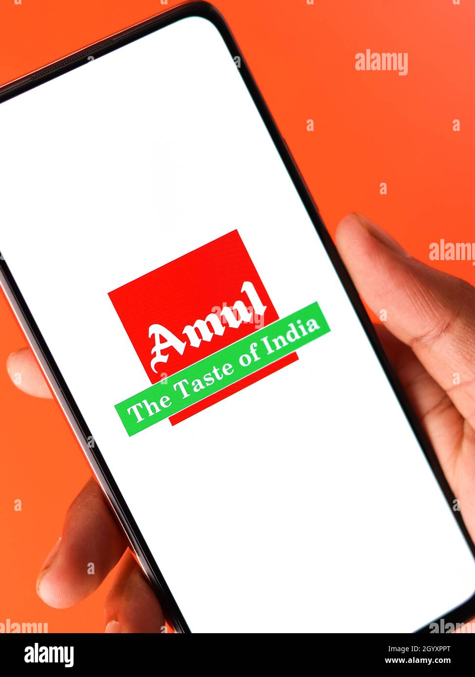 West Bangal, India - October 09, 2021 : Amul logo on phone screen stock ...