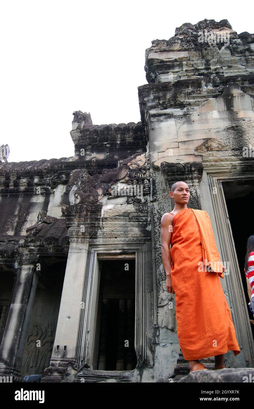 Cambodian novice monk travel visit and stand ritual meditation respect ...