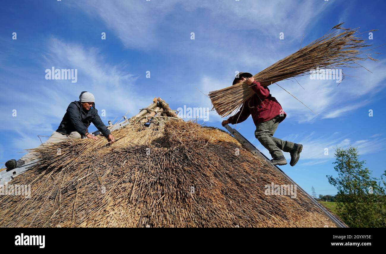 Veteran Jesse Swanson (left) joins Butser Ancient Farm's Will Scanlan ...