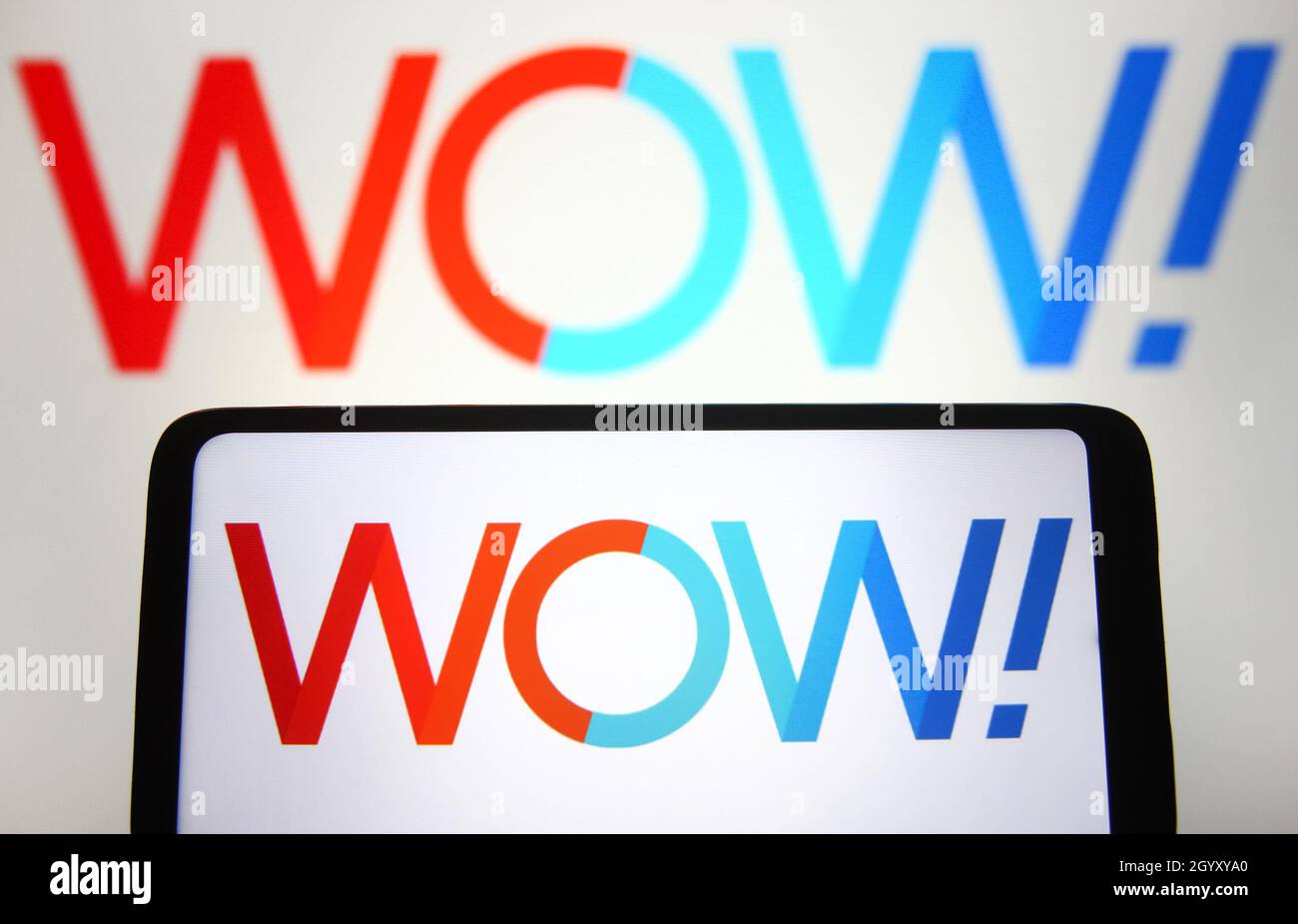 In this photo illustration a WideOpenWest (WOW!) logo is seen on a ...