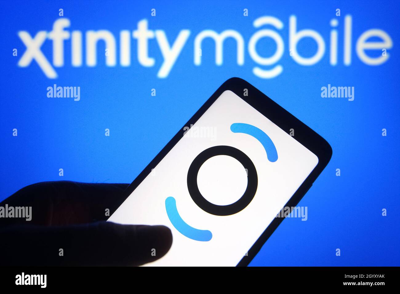 In this photo illustration a Xfinity Mobile logo is seen on a ...