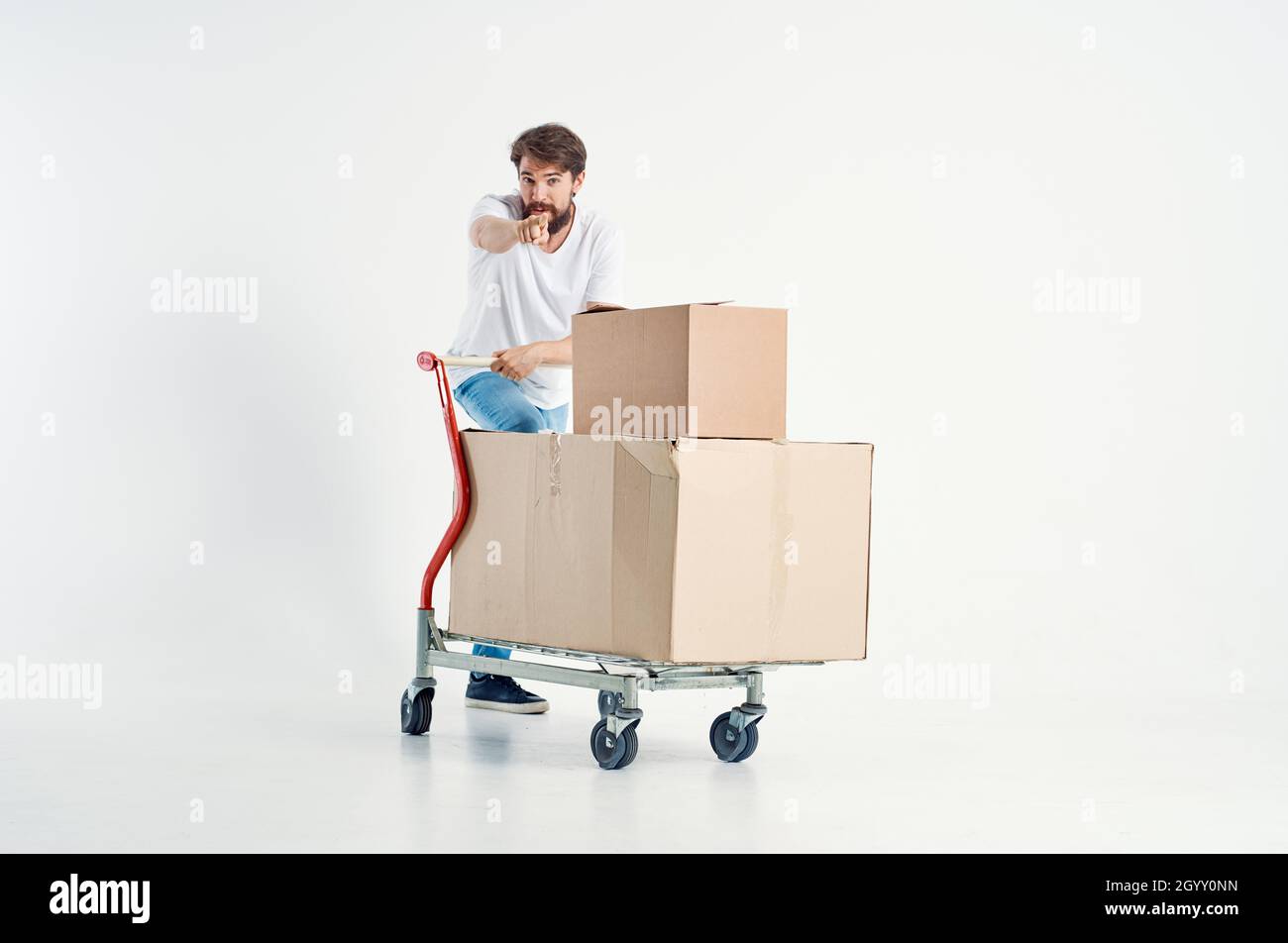 Man ride a cart entertainment isolated background Stock Photo - Alamy