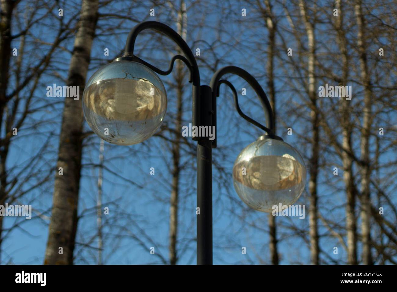 Street lighting during the day. Lighting in the park. Stand for light ...