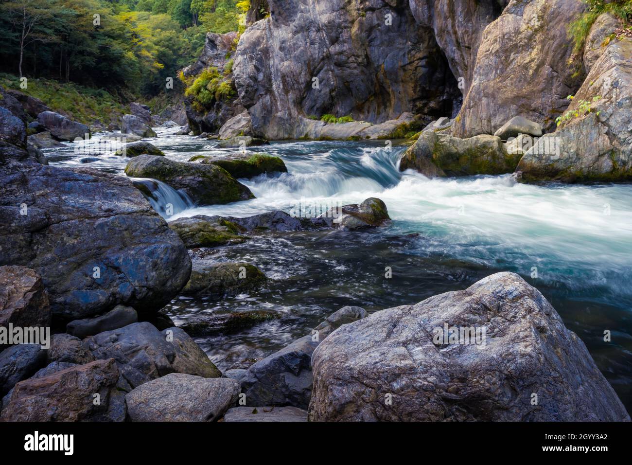Beautiful river with fresh blue deep water and long rock. rural place ...