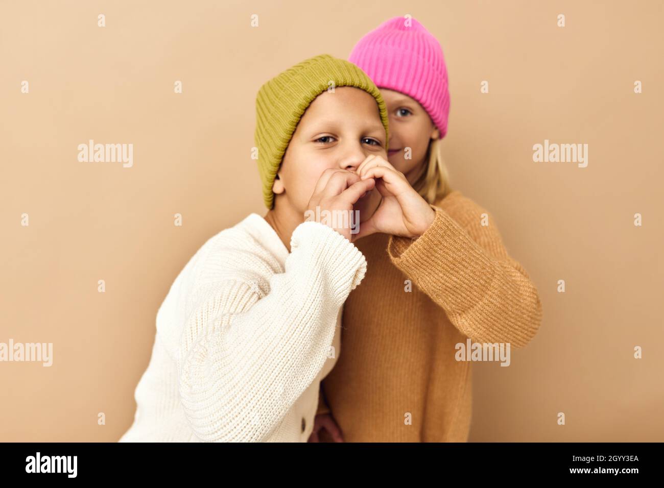 happy children hug games smile friendship beige background Stock Photo ...